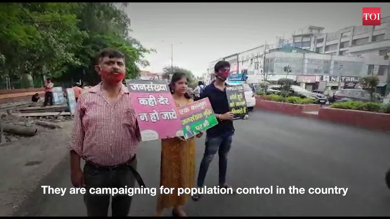 population control: Dehradun: Couple carry out a campaign for ...
