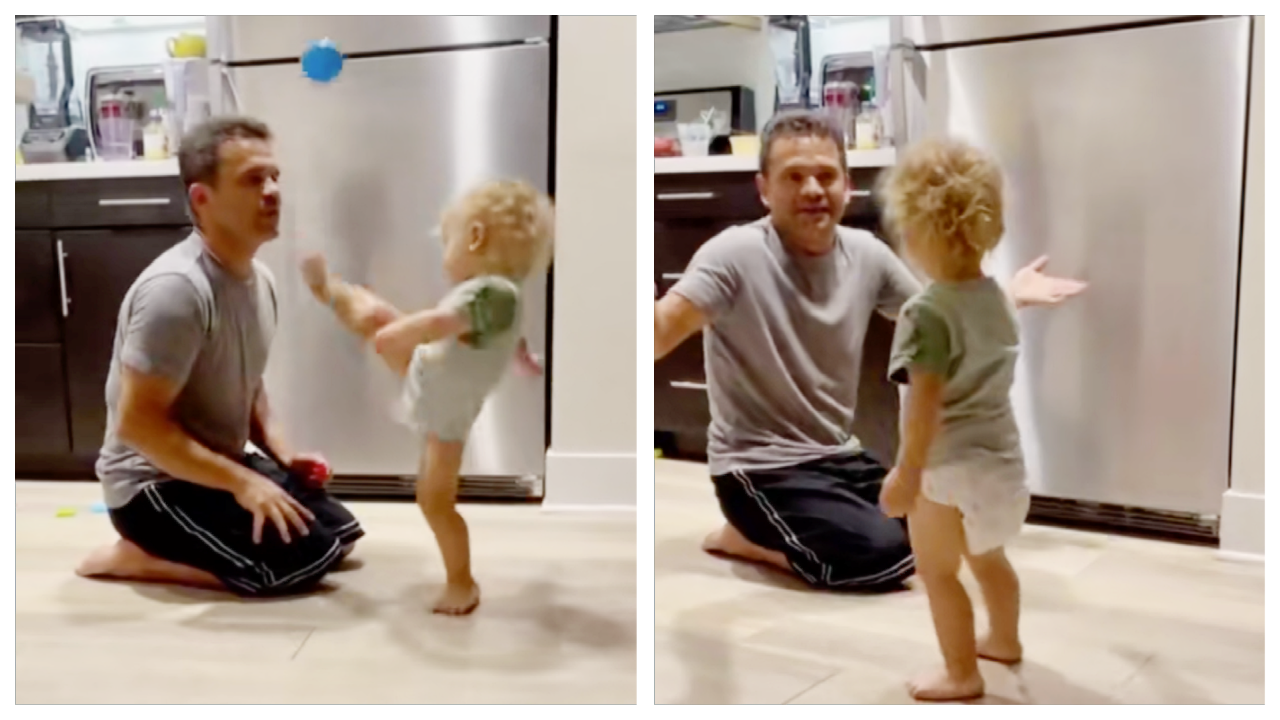 Daddy is training a future kick-boxer!