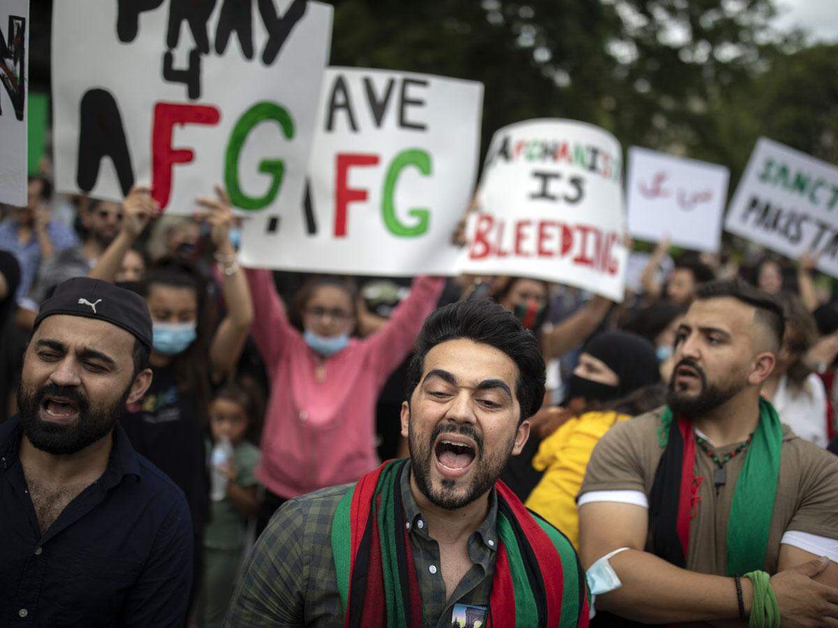 Hundreds of Afghans protest outside White House as Taliban takes ...
