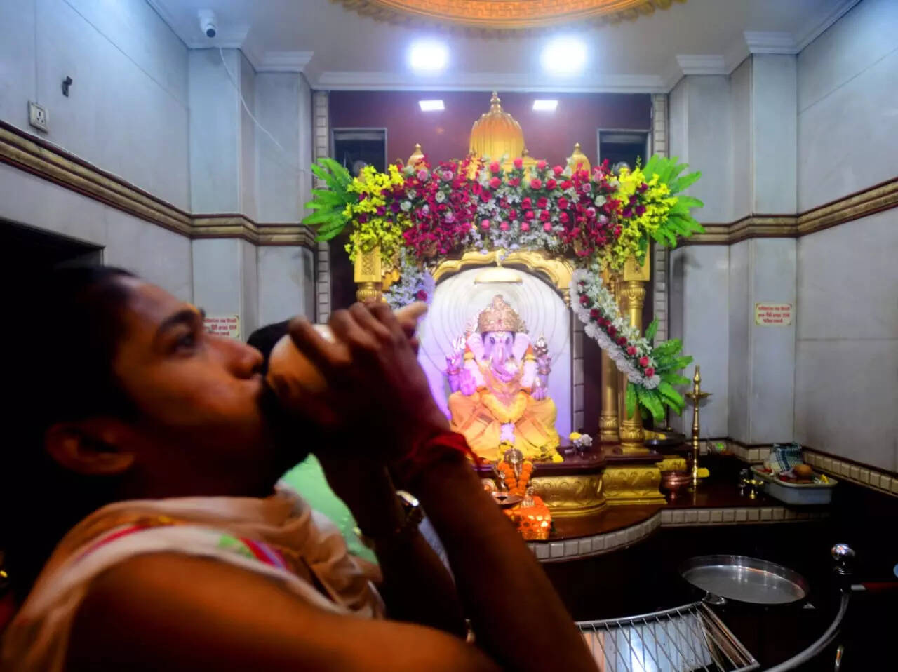 In Pics: Religious places reopen; CM Uddhav Thackeray visits Mumba Devi ...
