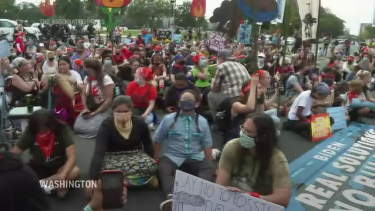 Climate activists protest outside U.S. Capitol