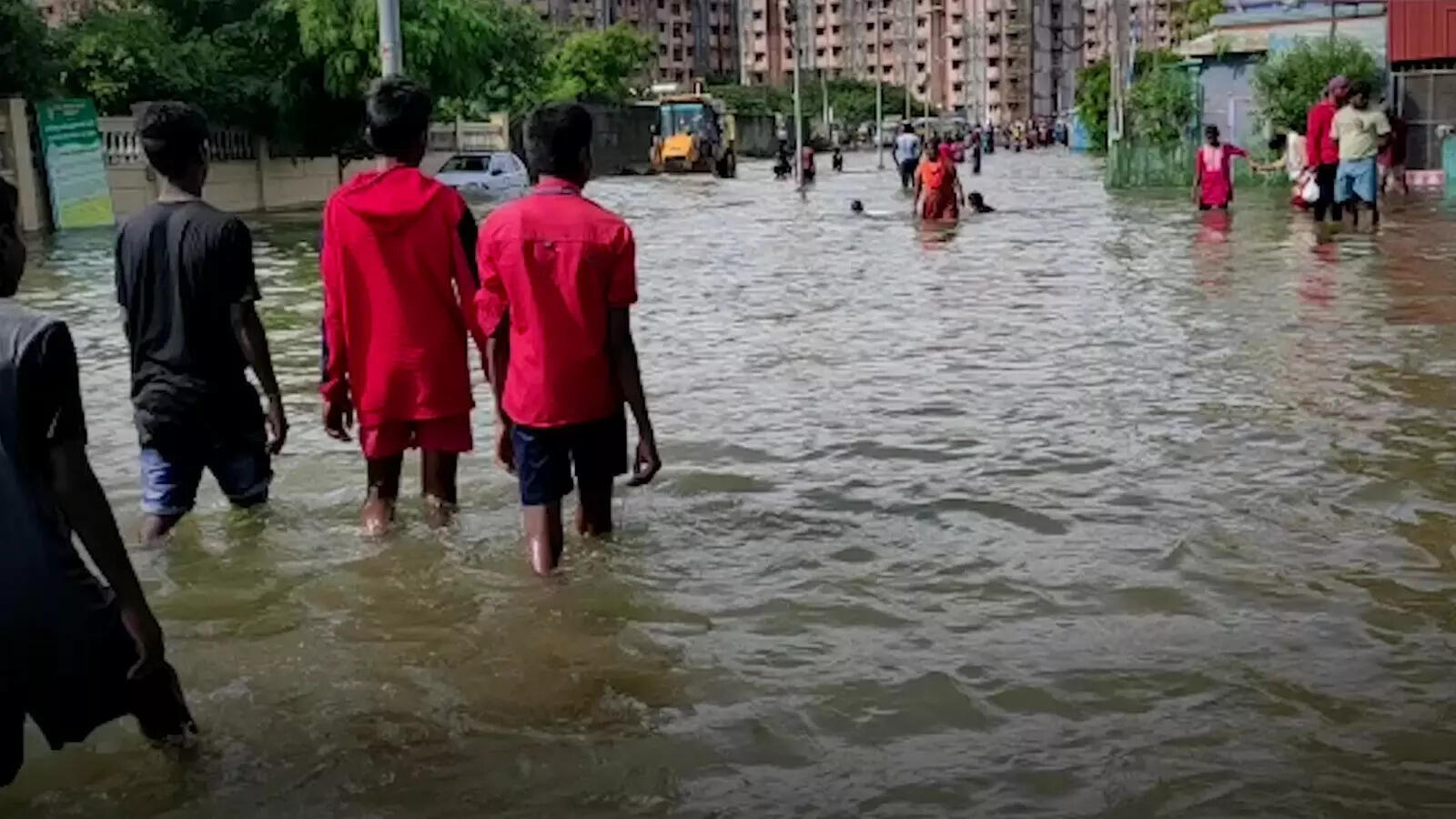Chennai rains: Residents wade through knee-deep waters to get essentials Chennai rains: Residents wade through knee-deep waters to get essentials
