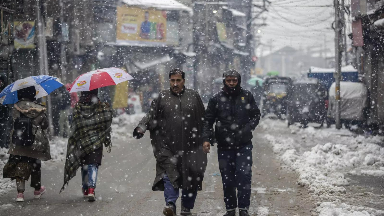In photos: Heavy snowfall disrupts life in hills