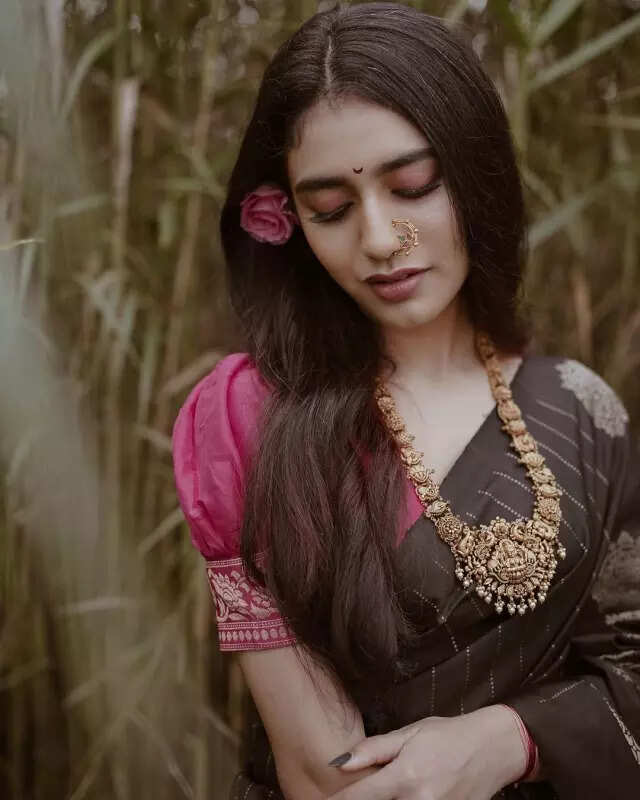 `Wink girl` Priya Prakash Varrier turns mermaid in a blue bikini ...