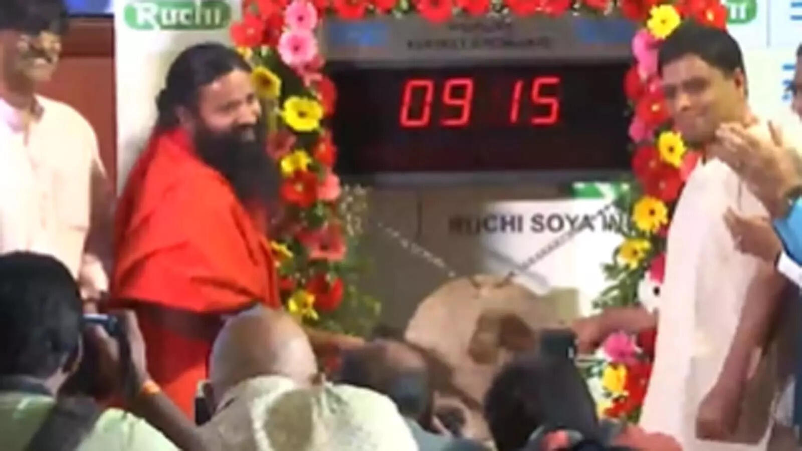 Why Baba Ramdev, Acharya Balkrishna are at Mumbai stock exchange