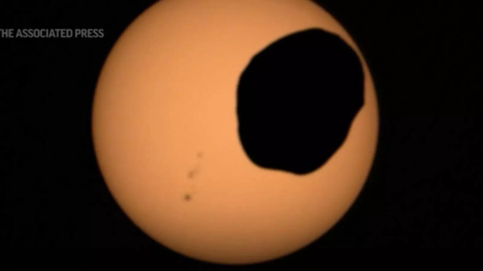 mars: Mars rover captures Mars moon eclipsing Sun