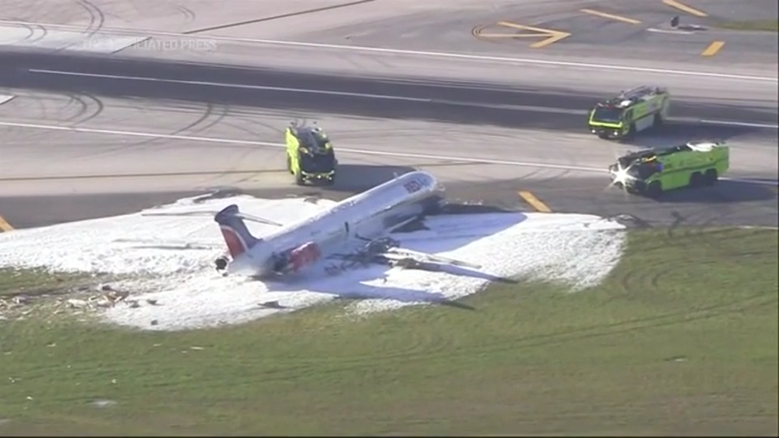 Plane runs of runway at Miami airport; 3 injured