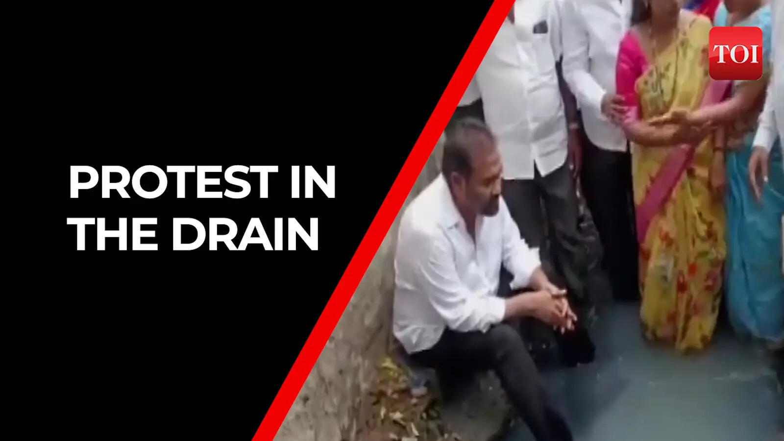 Andhra Pradesh: YSRCP MLA Kotamreddy Sridhar Reddy steps into drain to ...