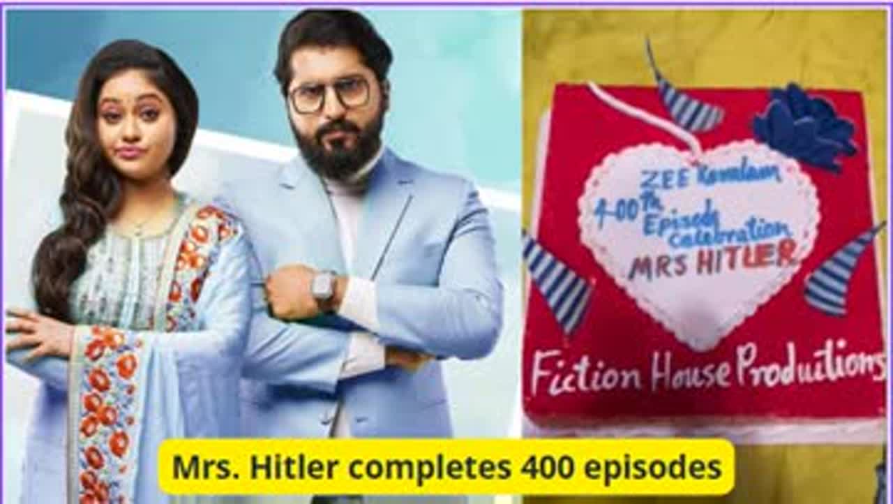 Mrs. Hitler completes 400 episodes; the team celebrates with a cake cutting
