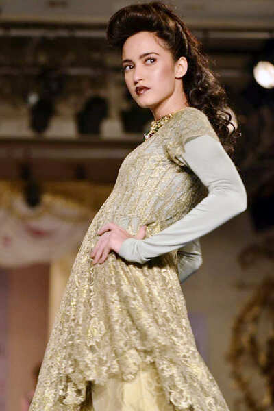 A model showcases a creation by designer Varun Bahl on Day 1 of the ...