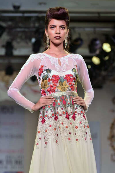 A model showcases a creation by designer Varun Bahl on Day 1 of the ...