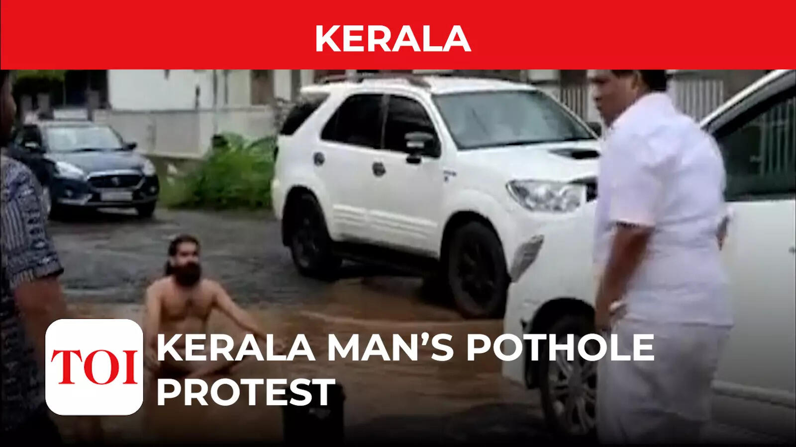 Watch: Kerala man takes bath in waterlogged potholes to protest against ...