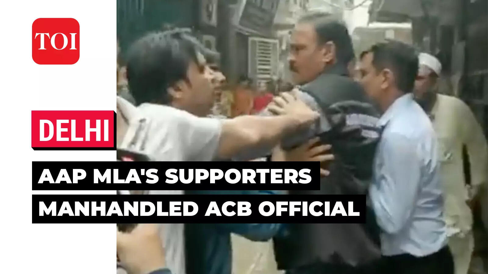 AAP MLA Amanatullah Khan's supporters manhandle ACB official during ... AAP MLA Amanatullah Khan's supporters manhandle ACB official during ...