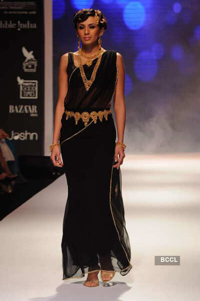 A model walks the ramp to showcase CVM exports jewellery collection ...