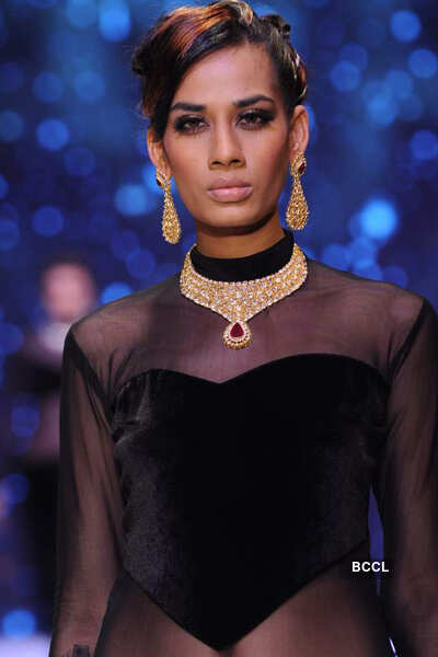 A model walks the ramp to showcase CVM exports jewellery collection ...