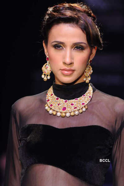 A model walks the ramp to showcase CVM exports jewellery collection ...