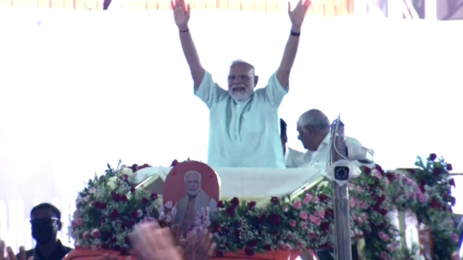 Gujarat: PM Modi greets crowd during his roadshow in Surat