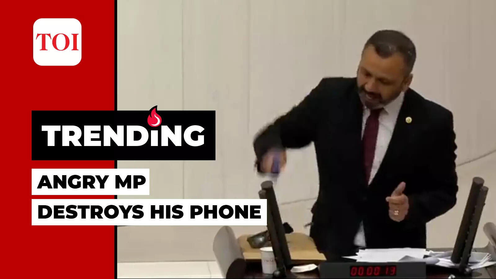 Watch: Turkish politician breaks his phone with a hammer in Parliament