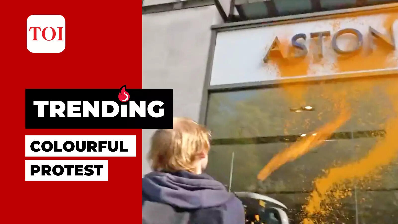 Watch: Climate activist sprays paint on luxury car Aston Martin showroom