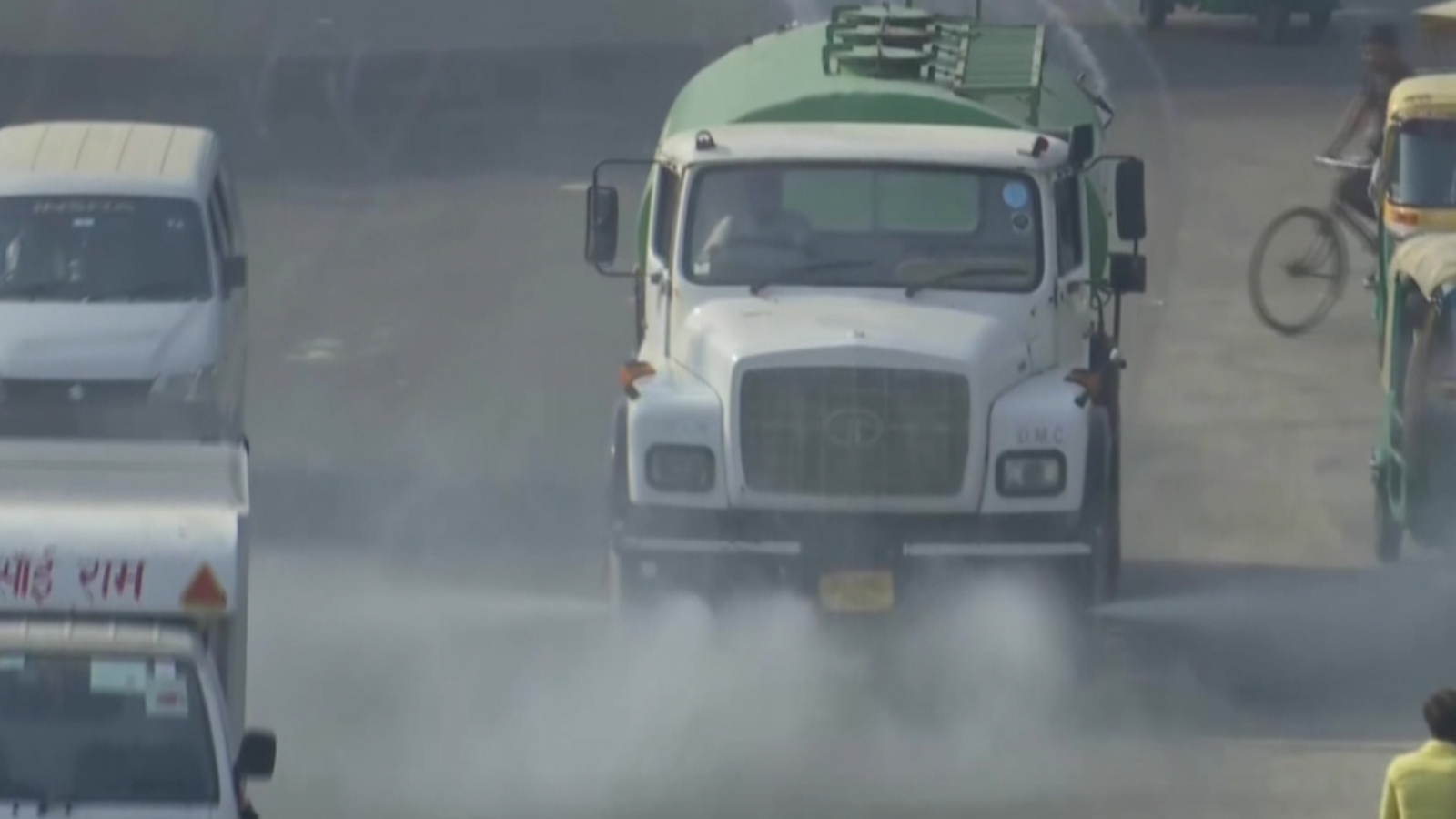 Delhi: Water sprinkled around Anand Vihar bridge to counter rising AQI