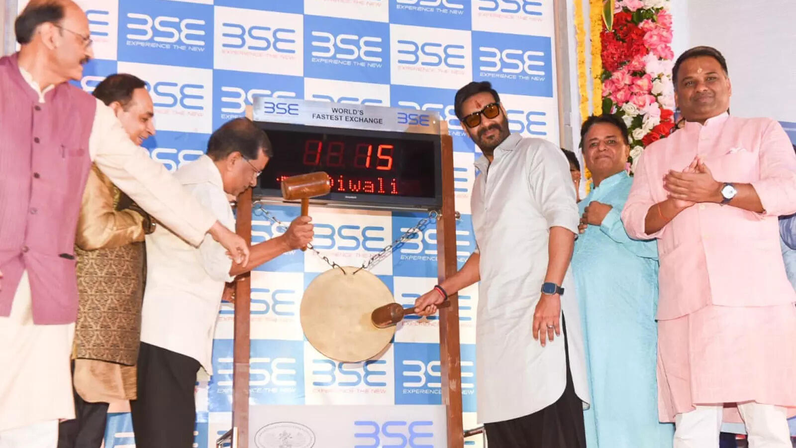 Ajay Devgn attends the opening bell ceremony at Bombay Stock Exchange ...