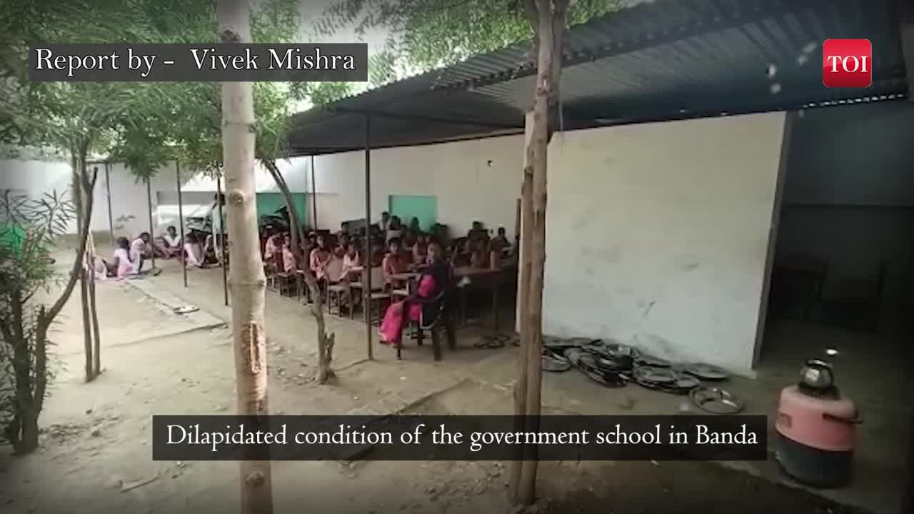 Students studying in a tin shed, three classes merge into one due to a ...
