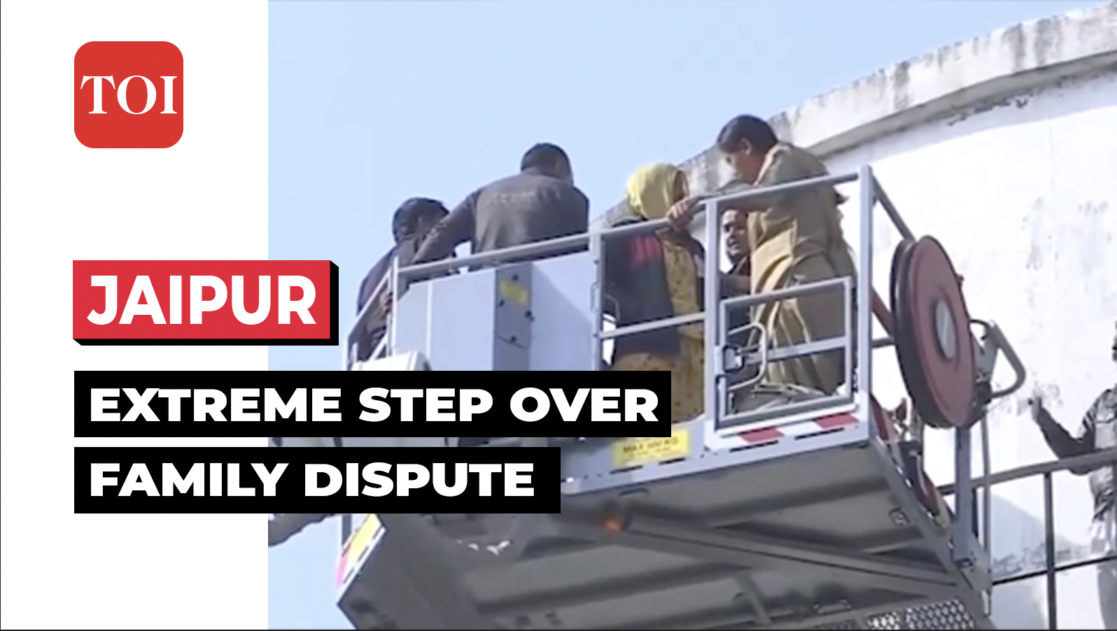 Watch: Woman with child climbs water tank, rescued