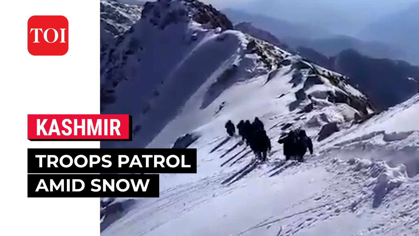 BSF troops patrol along the Line of Control in Kashmir amid heavy snowfall