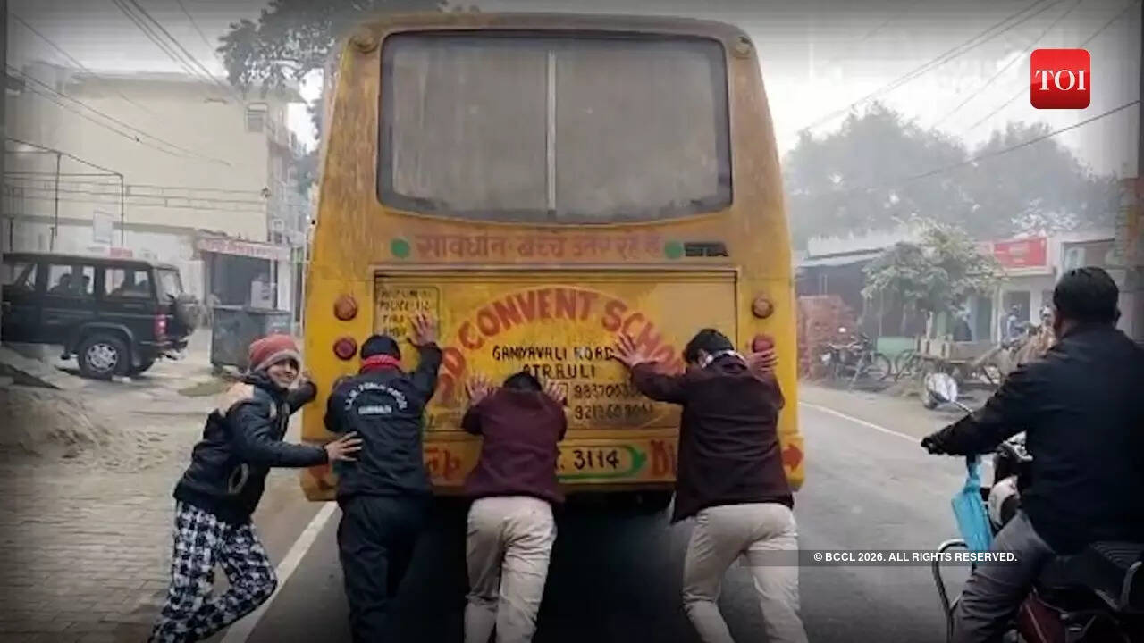 A bus driver makes kids push school bus on the way to school in Bulandshahr