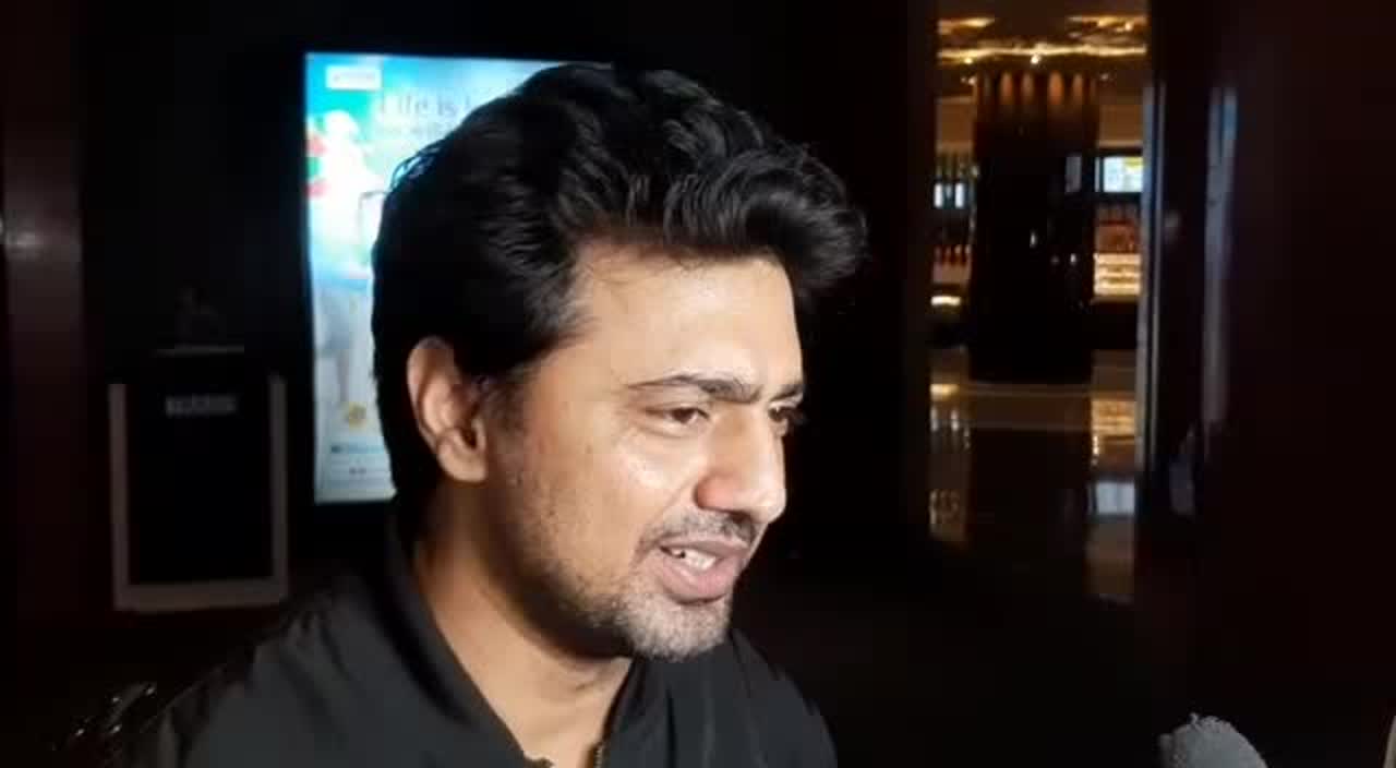 Dev at a film screening in the city