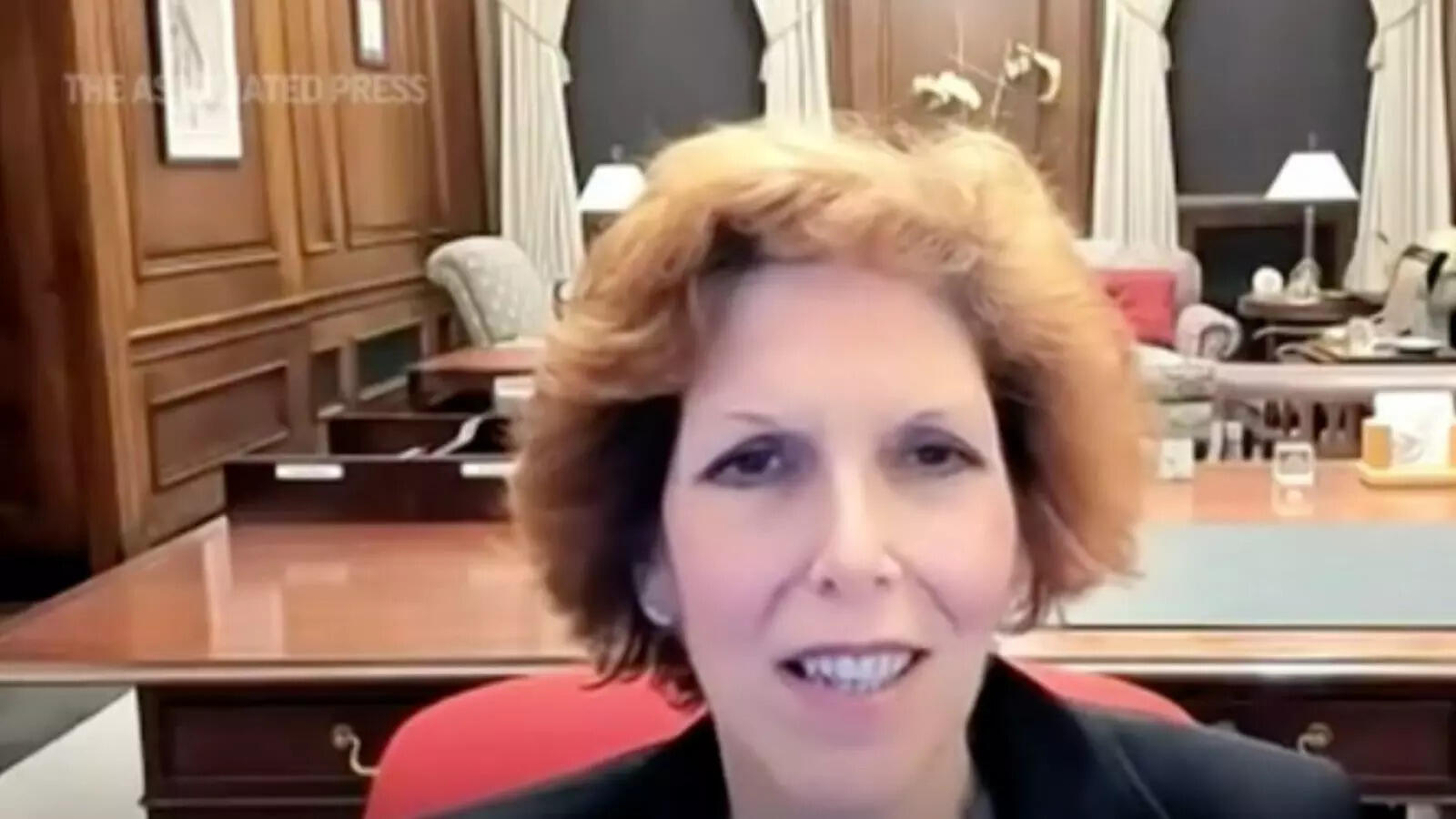 Fed official says rate hikes are beginning to work