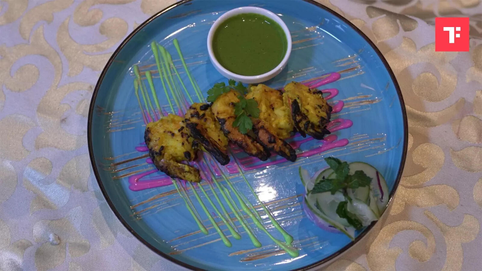 Watch: How to make Lasooni Jhinga - Times Food