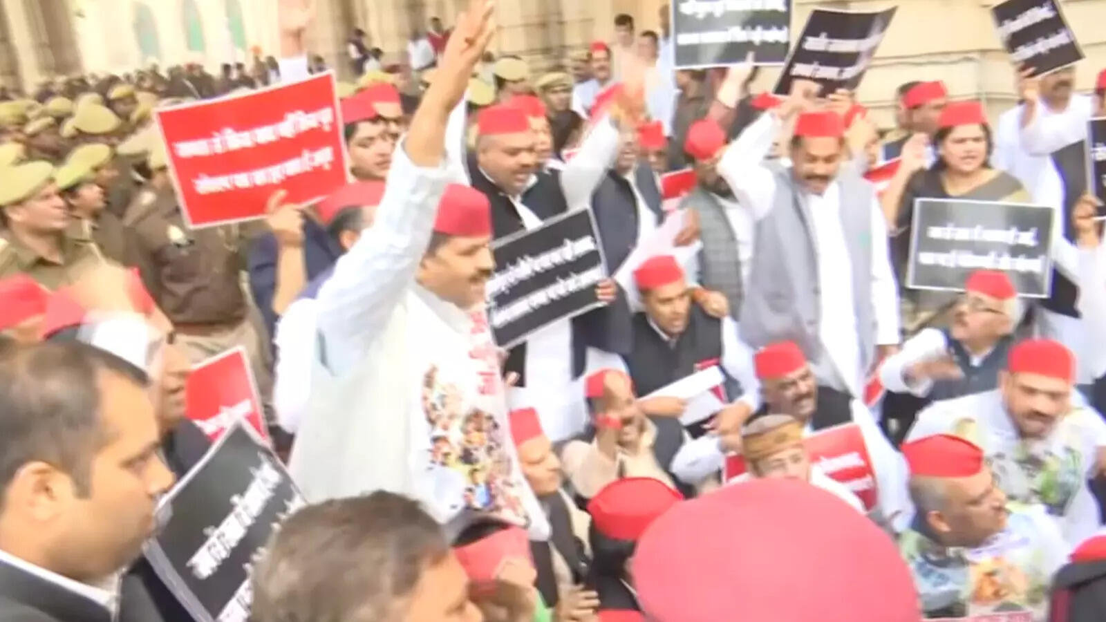 Samajwadi Party MLAs protest outside UP Assembly in Lucknow