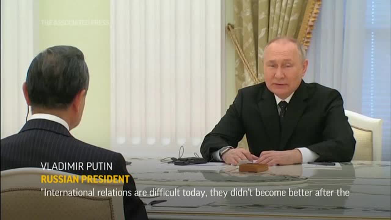 Russia, China showcase ties as Putin meets Wang