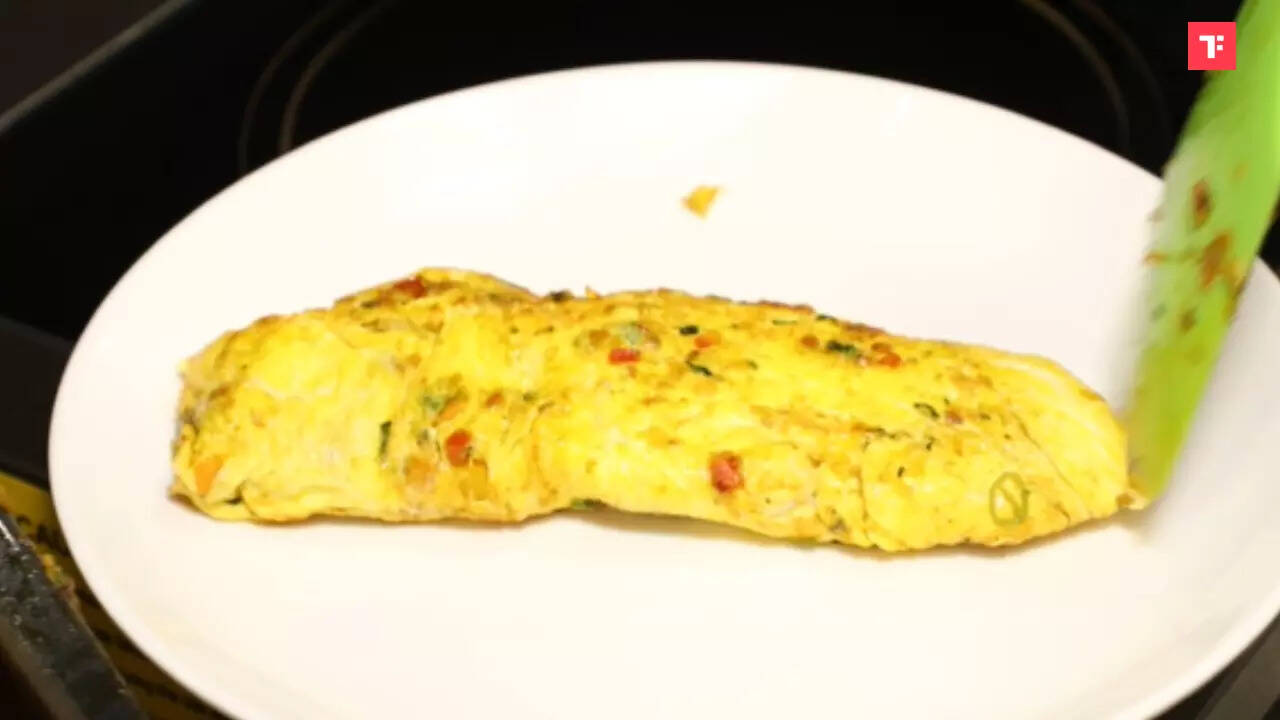 Watch: How to make Country Style Flat Masala Omelette - Times Food