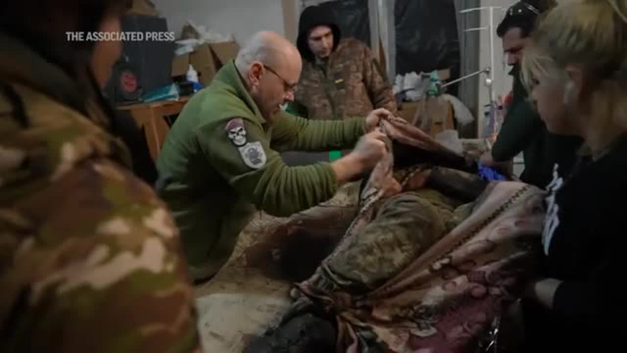 Ukraine medics treat wounded soldiers near Bakhmut