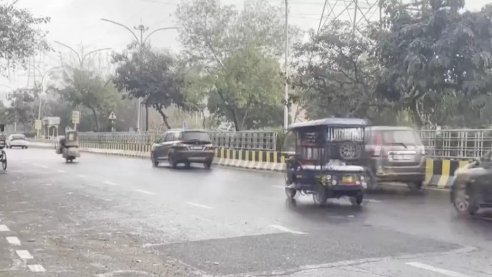 Noida gets relief from unusually warm February as rain lashes part of city