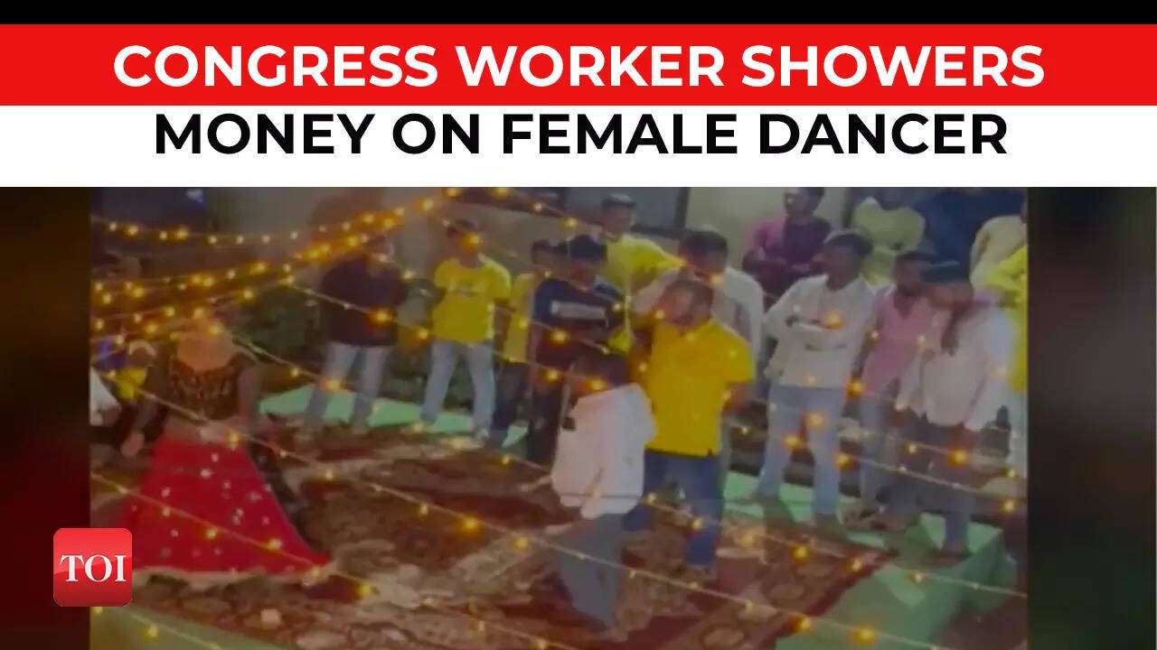 Congress worker showers money on female dancer in Karnataka's Dharwad ...