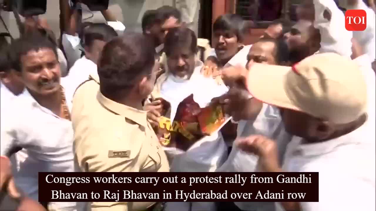 adani: Adani row: Congress workers carry out a protest rally from ...