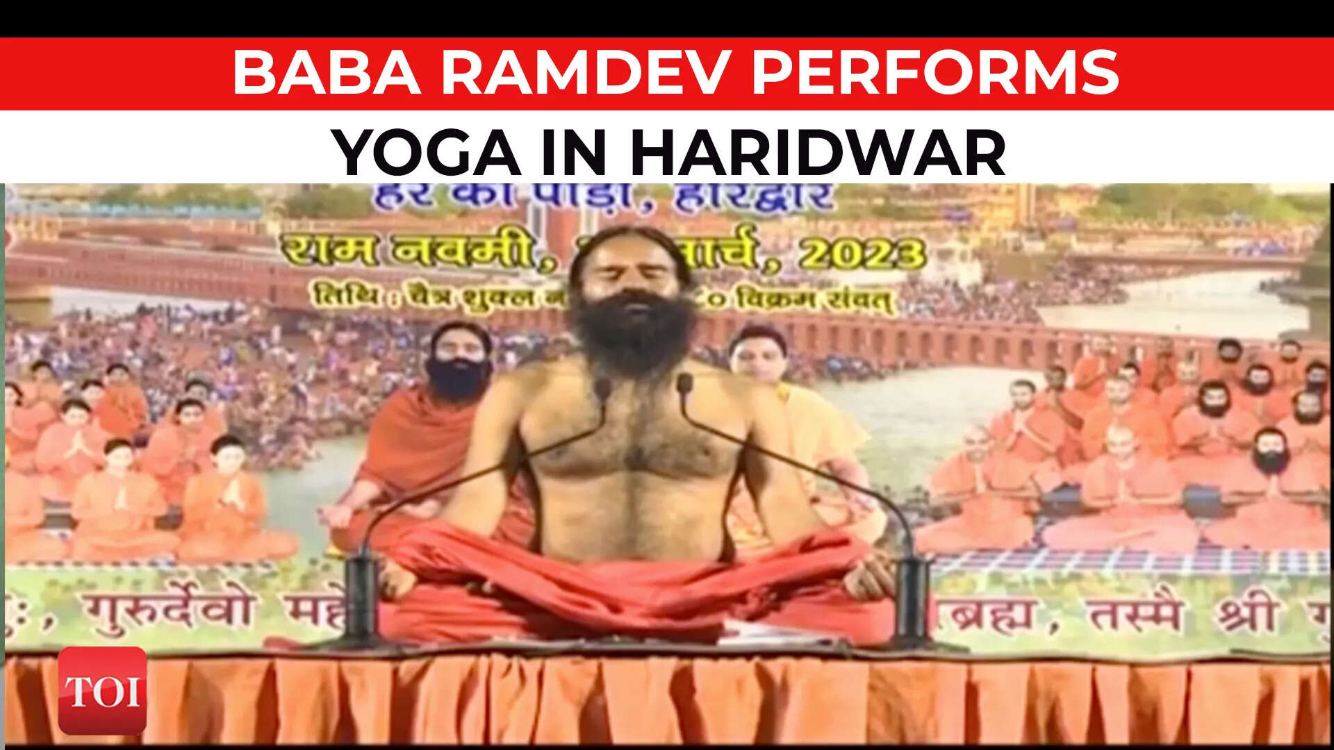 Yoga guru Baba Ramdev performs yoga in Haridwar, leads a group of people in yoga session