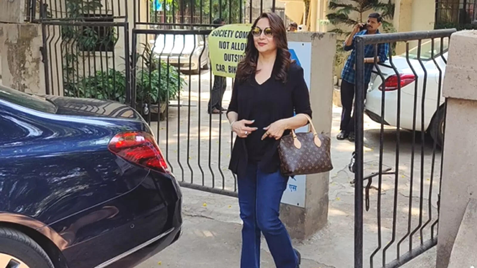 Madhuri Dixit Nene exudes boss lady vibes in black top and unbuttoned shirt