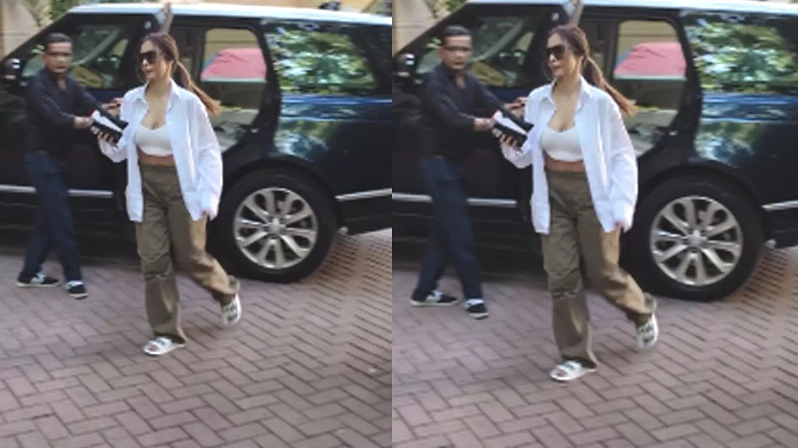 Malaika Arora stuns in unbuttoned shirt and crop top