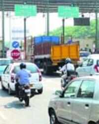 Angry motorists break toll gate