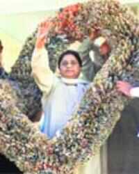 Another cash garland worth Rs 18 lakh for defiant Maya