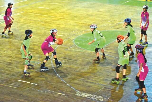 tamil nadu roll ball association: Throwing and dribbling while on a ...