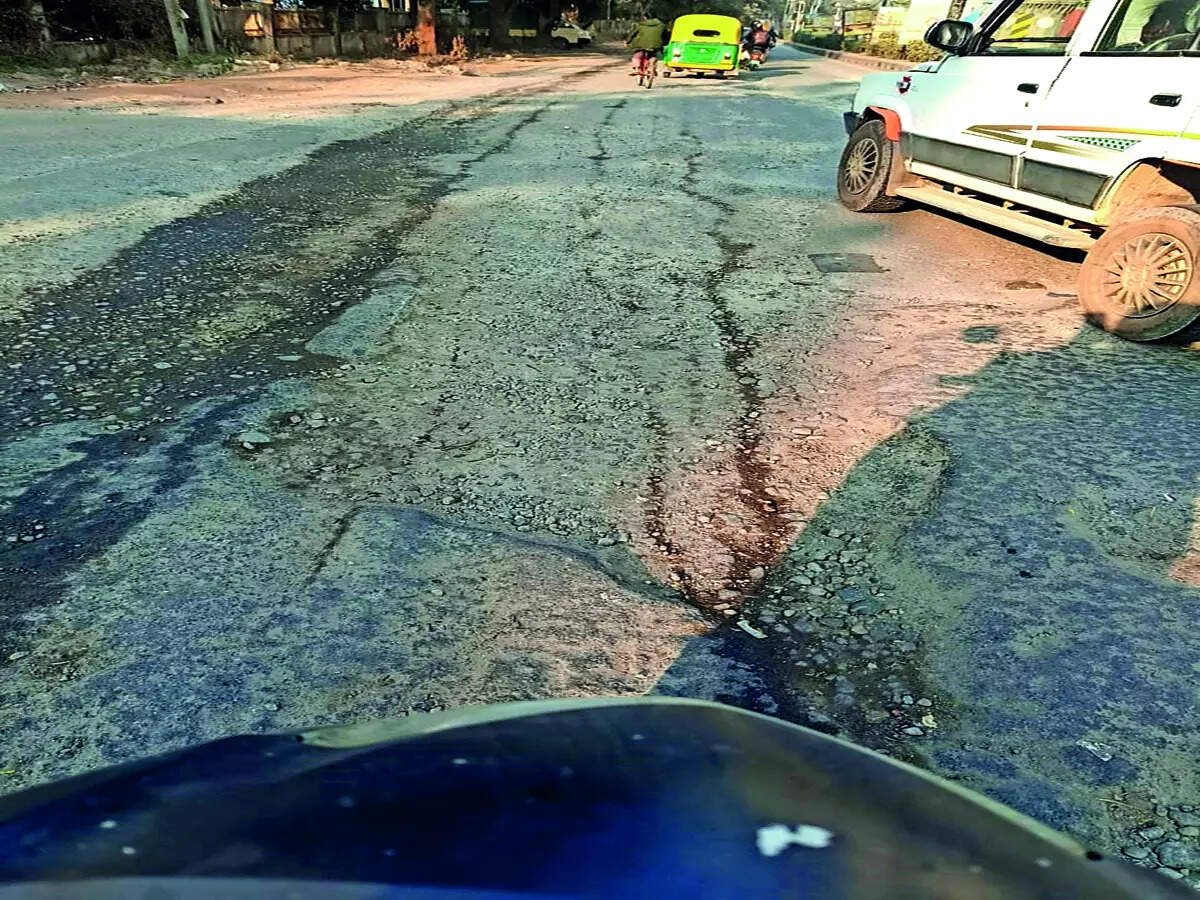 Pothole-ridden Jigani–Bommasandra Road turns daily commute into ordeal