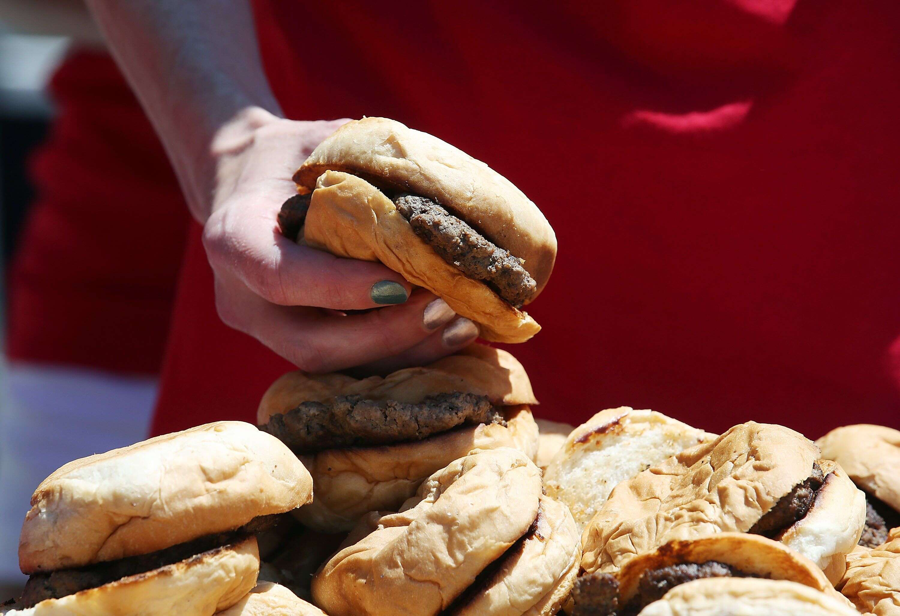 burger eating competition: Burger eating competition leaves winner with ...