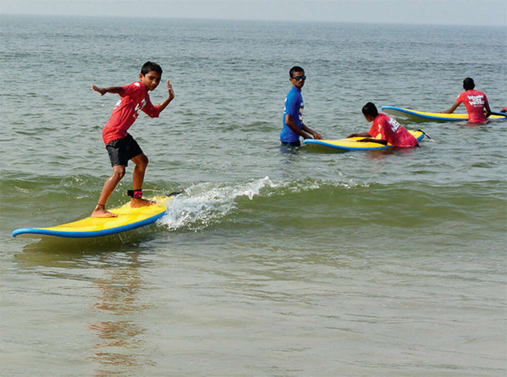 Children from govt schools learn to ride the waves