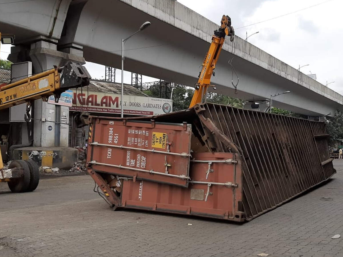 Photos: Container falls 40 ft from bridge in Thane, driver killed ...
