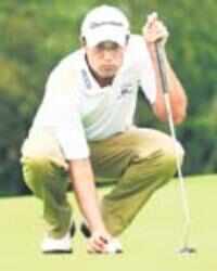 Atwal equals tournament record to take lead